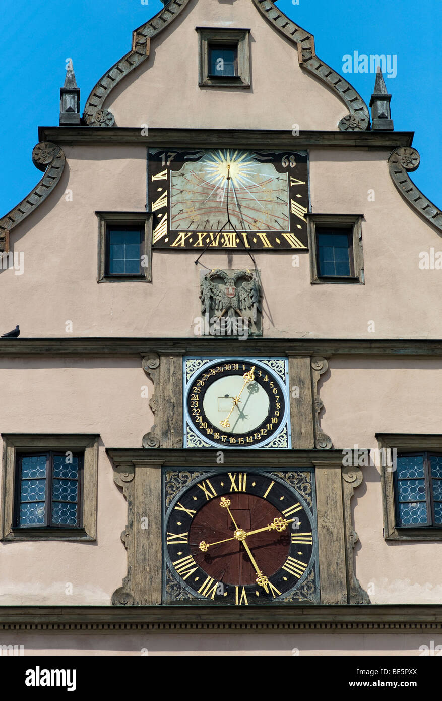 Clocks on a house, Rothenburg ob der Tauber, Bavaria, Germany, Europe ...