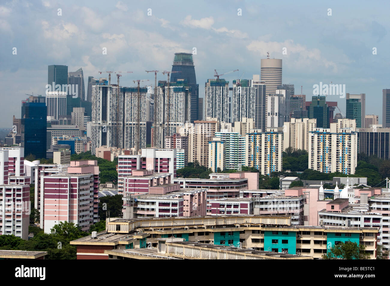 Singapore skyline, skyscrapers with cheap housing, behind the expensive ...