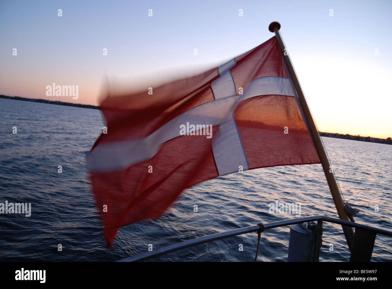 Danish red flag with white cross Stock Photo - Alamy