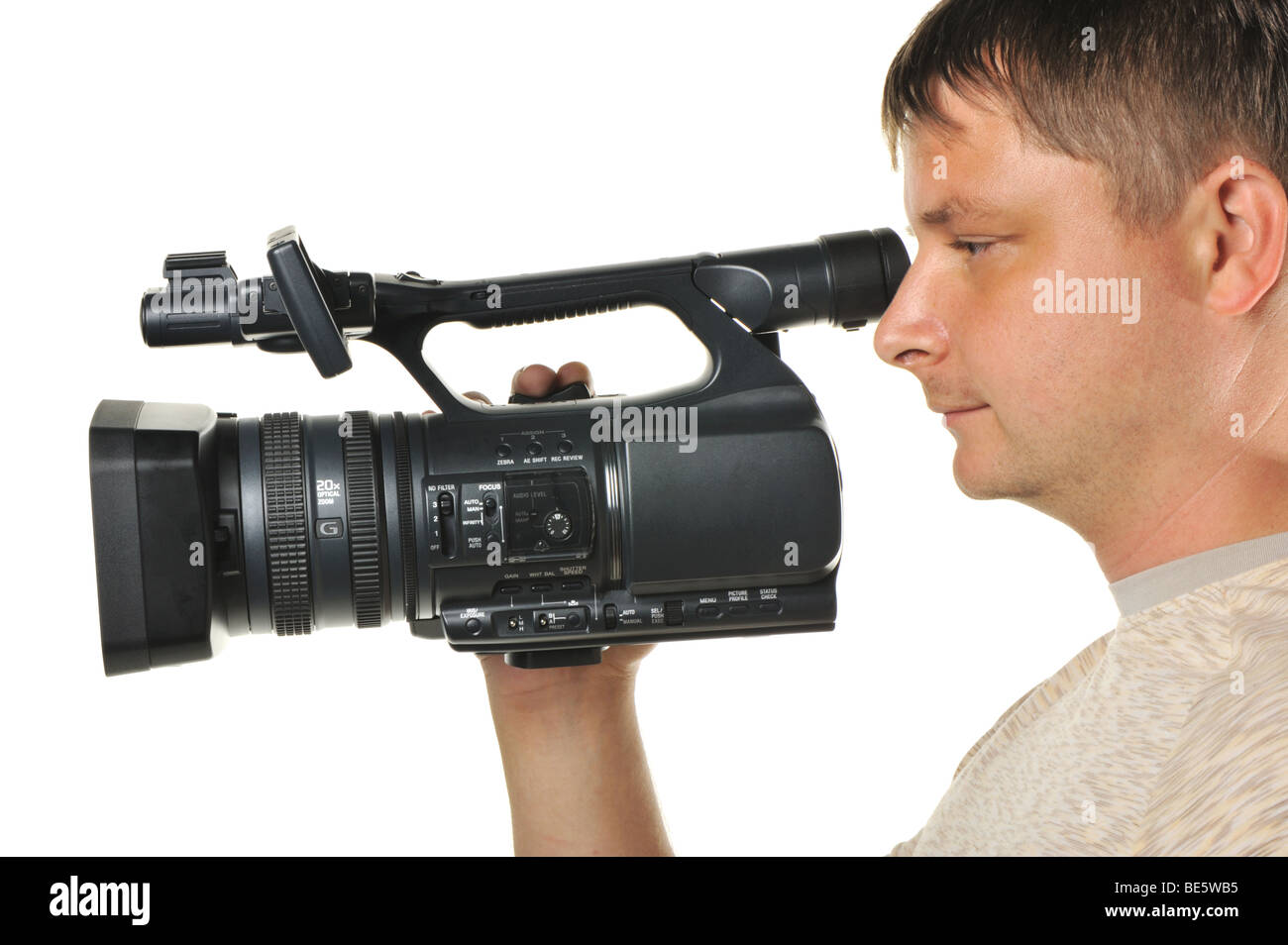 The man with a videocamera. It is isolated on a white background Stock ...