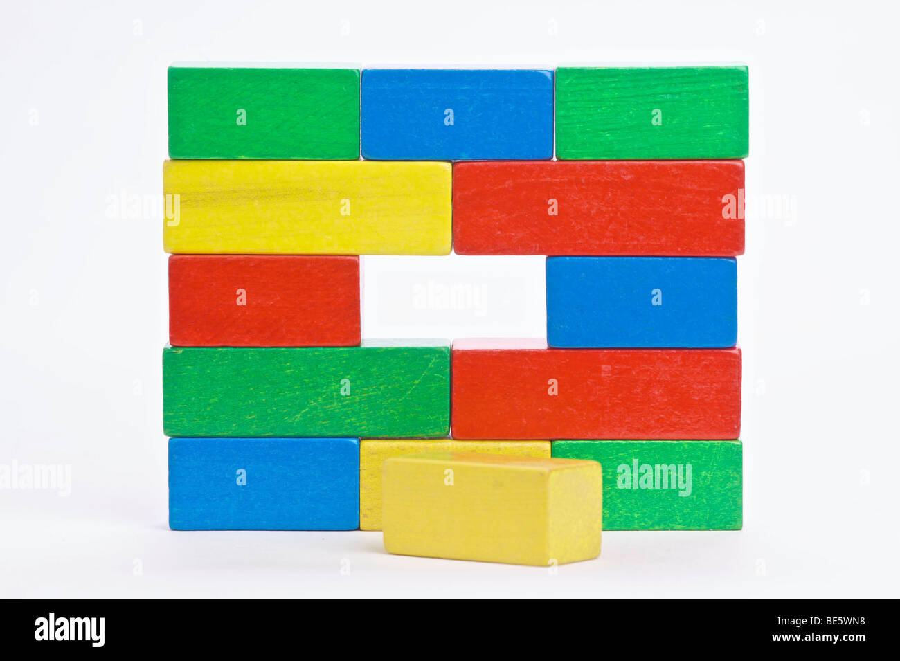 Colorful wall made of building blocks with a missing element Stock ...