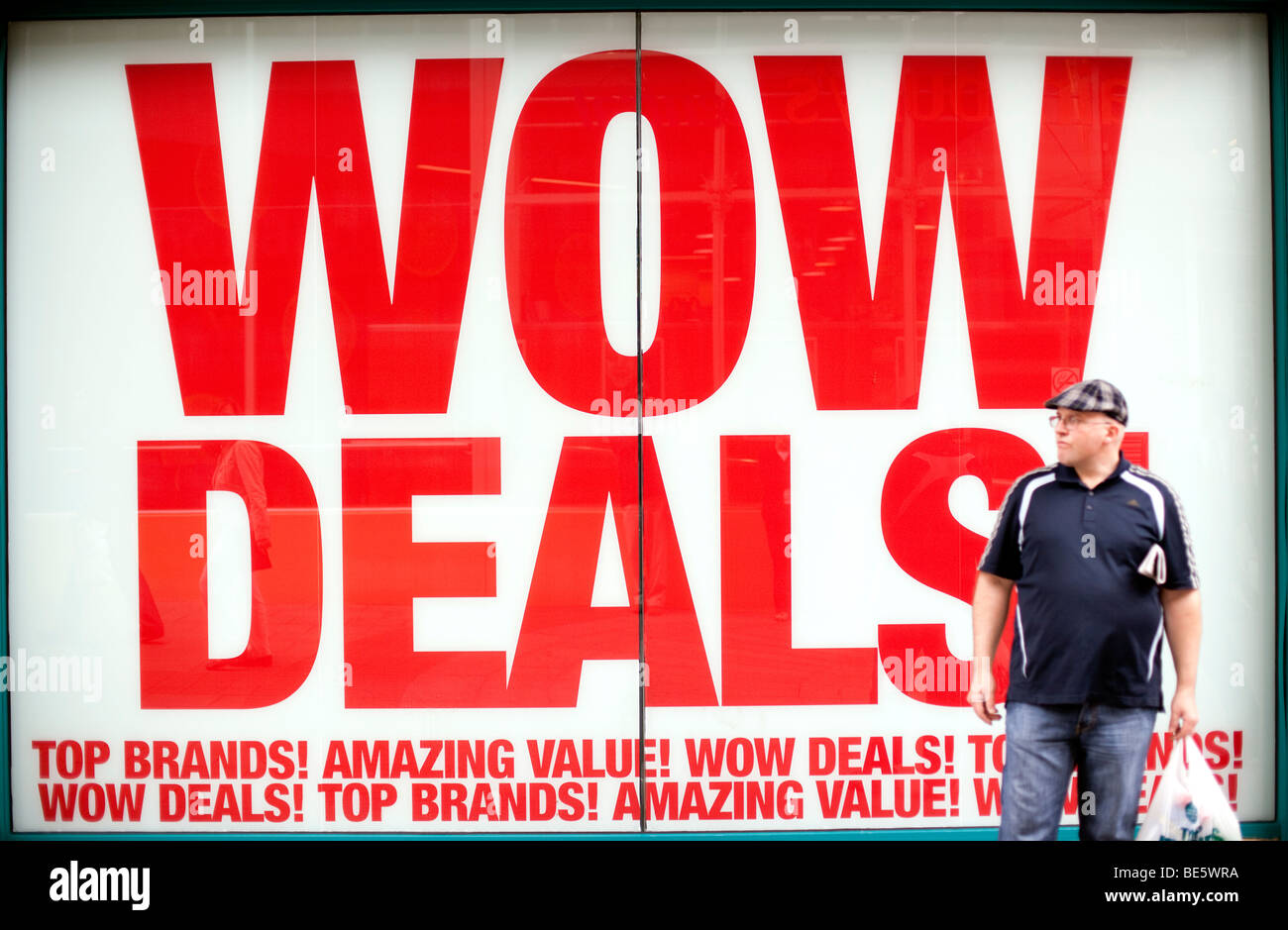 A huge poster offering "Wow" deals in a shop in Birmingham, England, UK ...