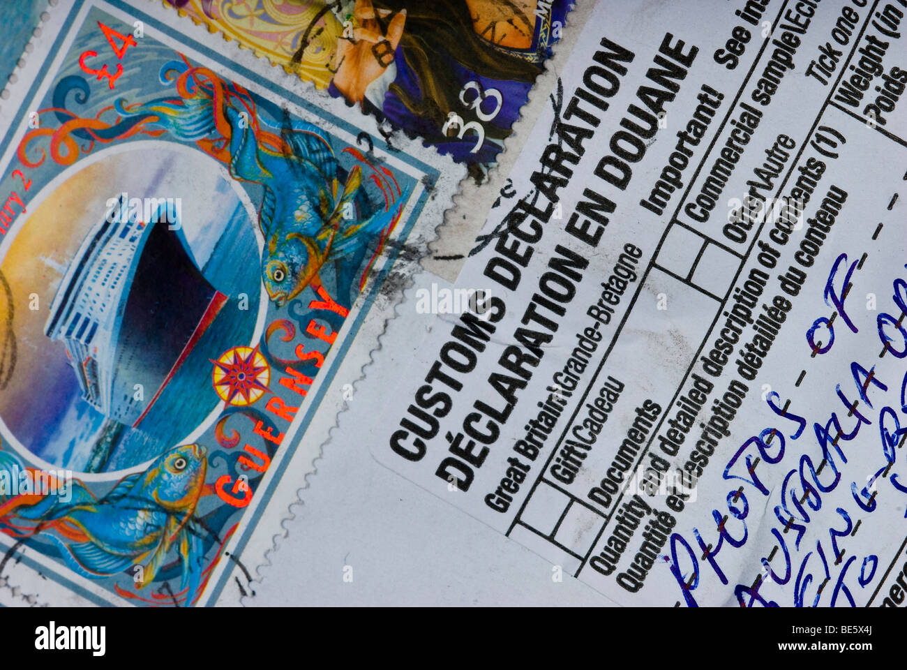 Envelope with colorful stamps from Guernsey and showing customs ...