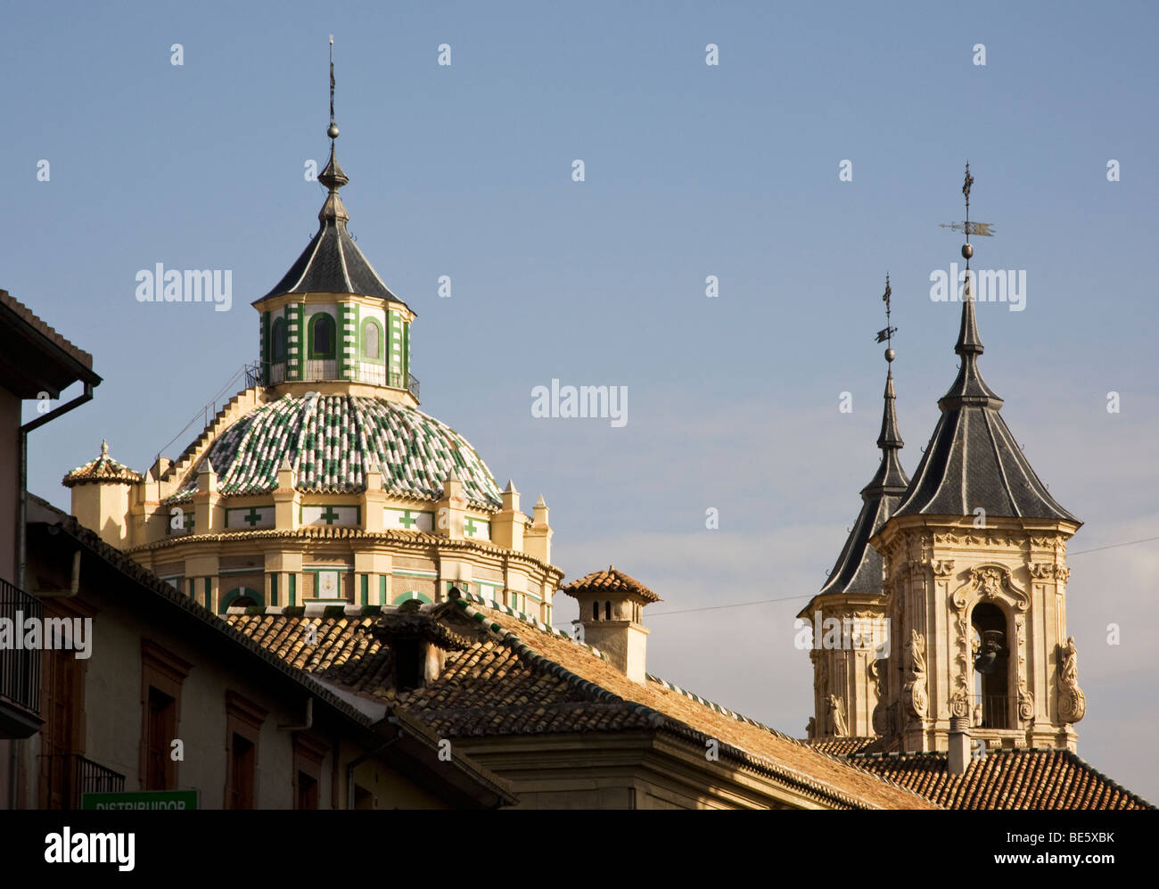 Green and white tiled roof of an old Spanish religious hospital in ...
