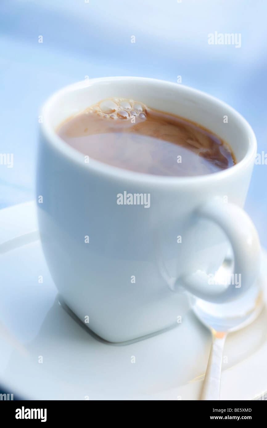 Cup of filter coffee with milk Stock Photo - Alamy