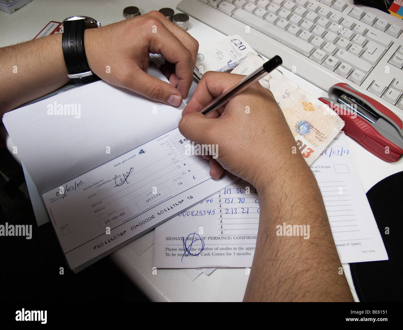 Business Cheque High Resolution Stock Photography and Images - Alamy