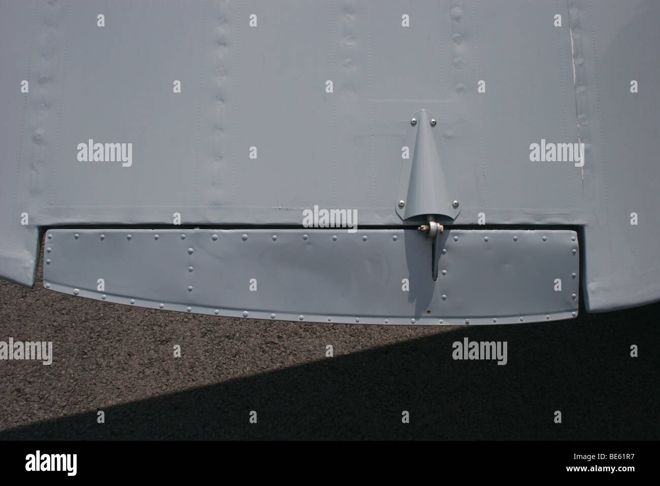 Detail of tail section on small aircraft showing various elevator types ...