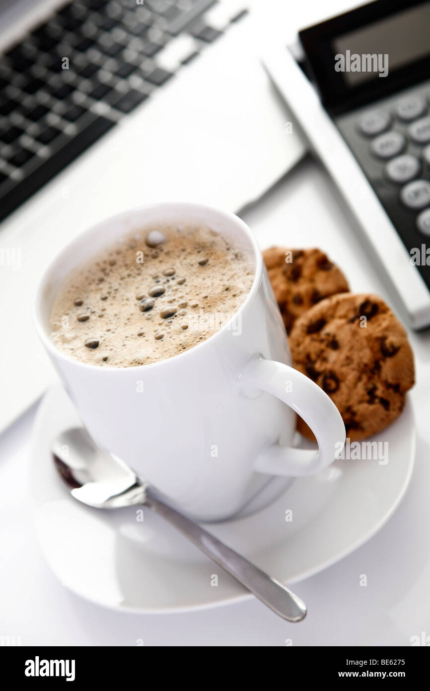 Cup of coffee in the office Stock Photo - Alamy
