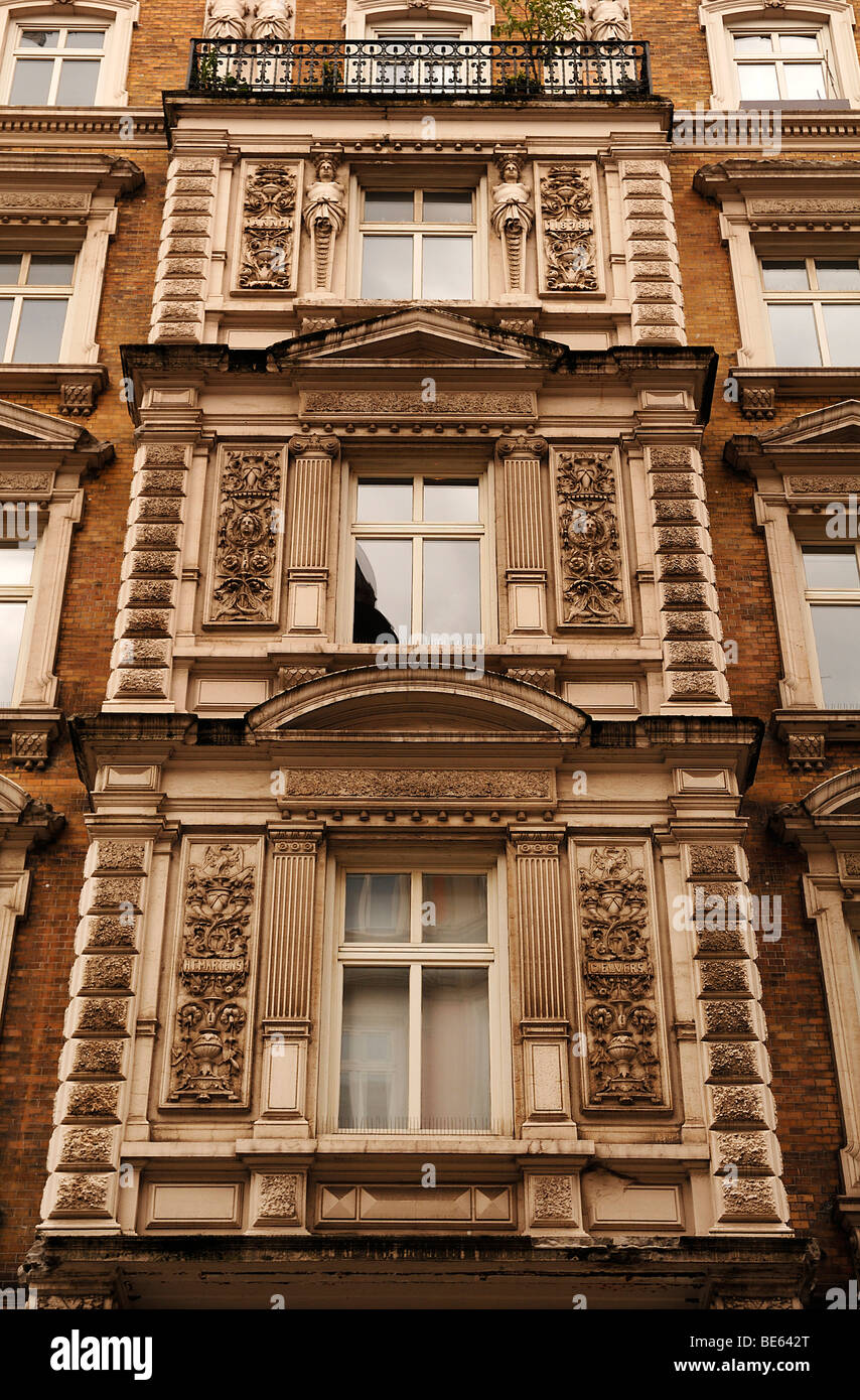 Old decorative house facade with bay windows and balconies, 1870-1890 ...