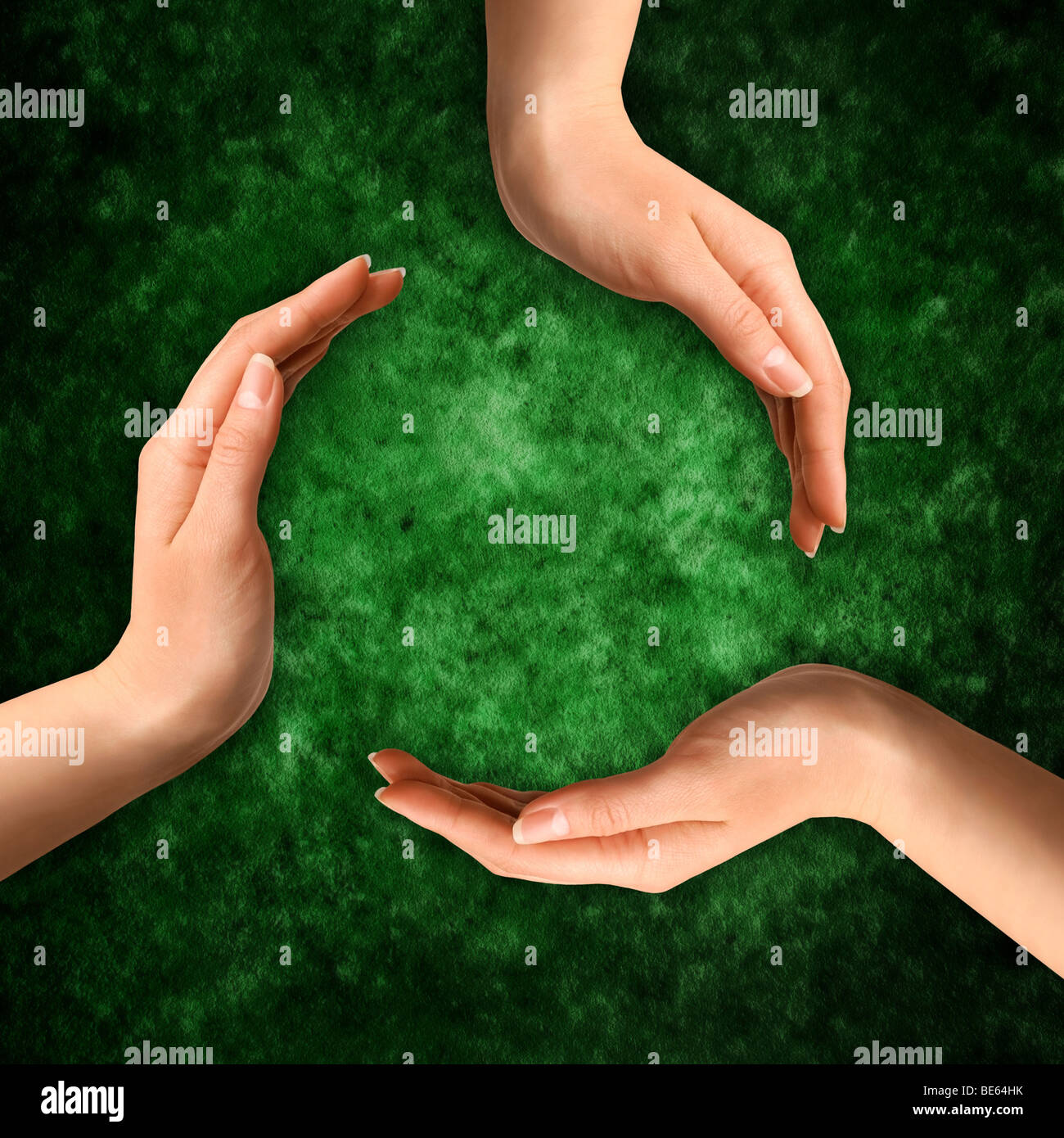 Conceptual recycling symbol made from hands Stock Photo - Alamy