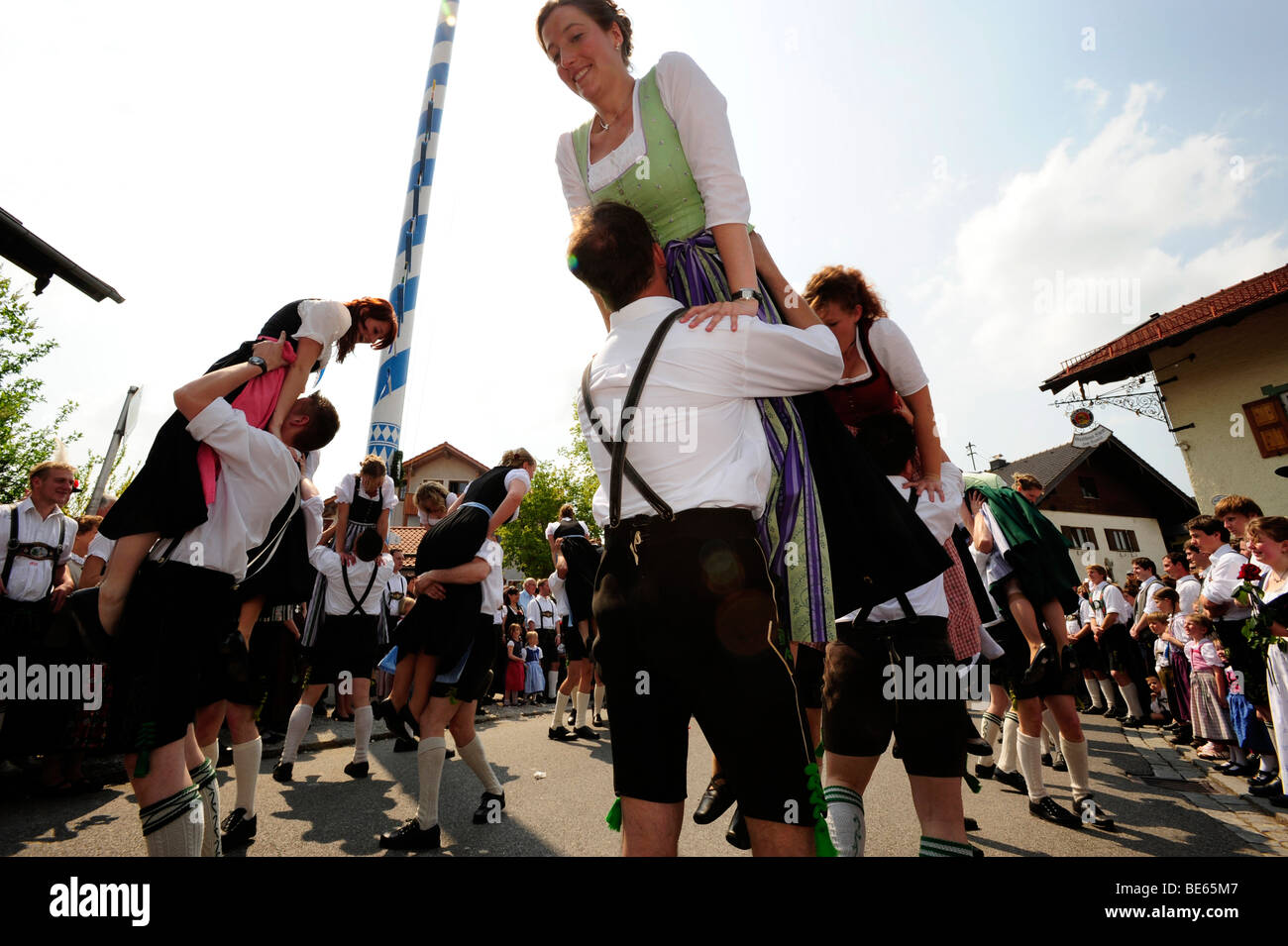 Dance around maypole traditional costume hi-res stock photography and ...