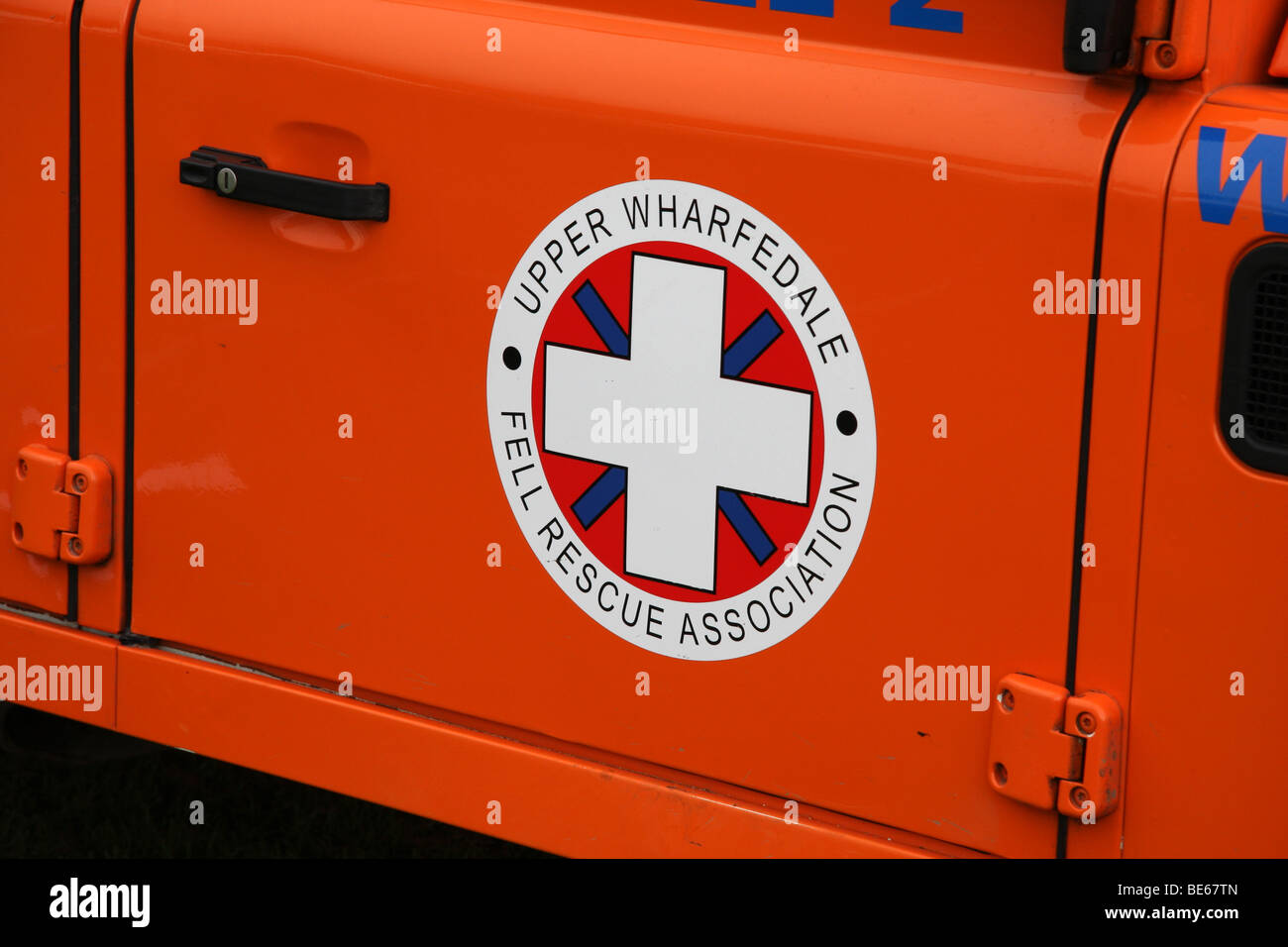 Upper Wharfedale Fell Rescue symbol on side of Land Rover Stock Photo ...