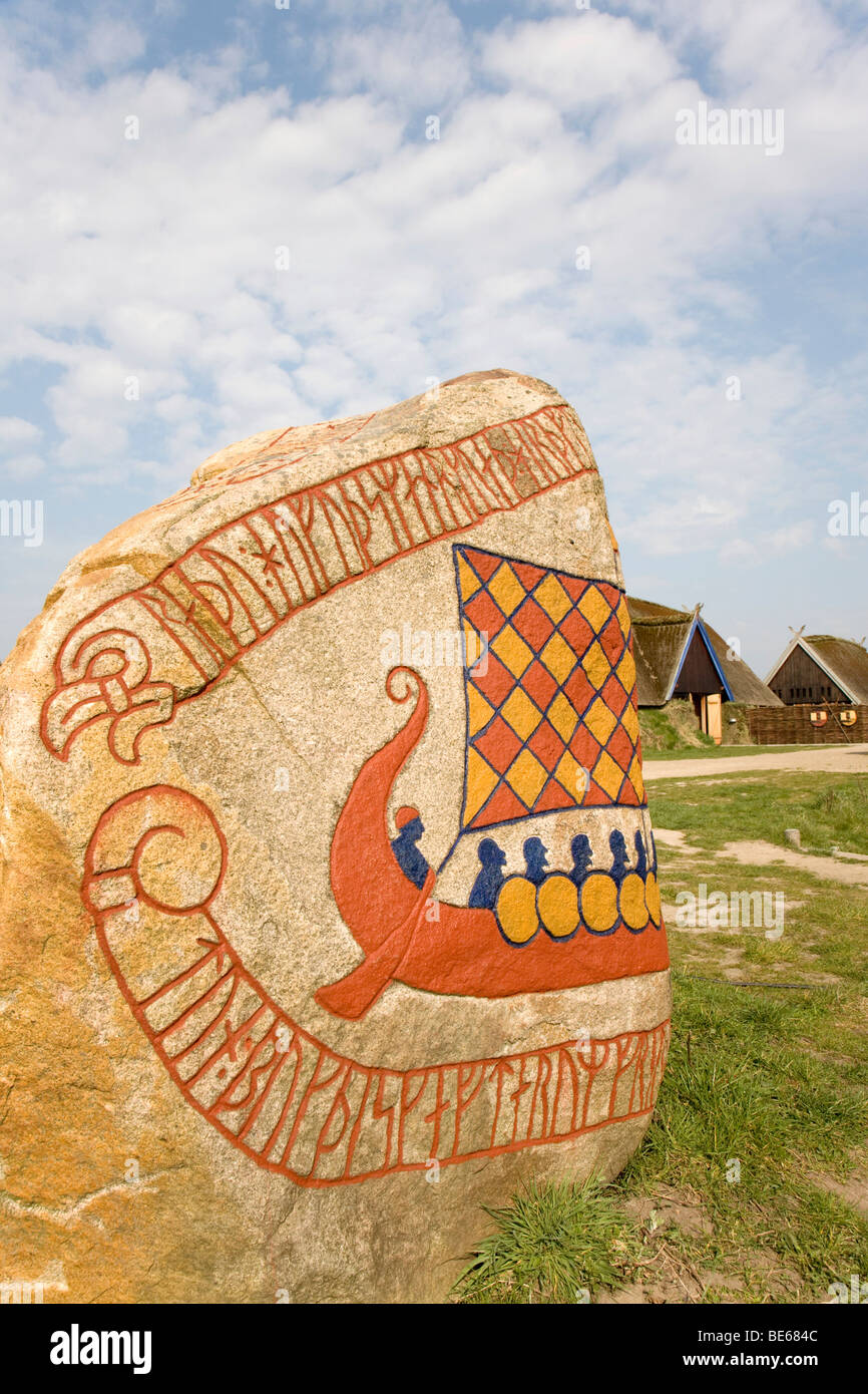 Inscription and a Viking boat on a rune stone, at the Viking Museum in ...