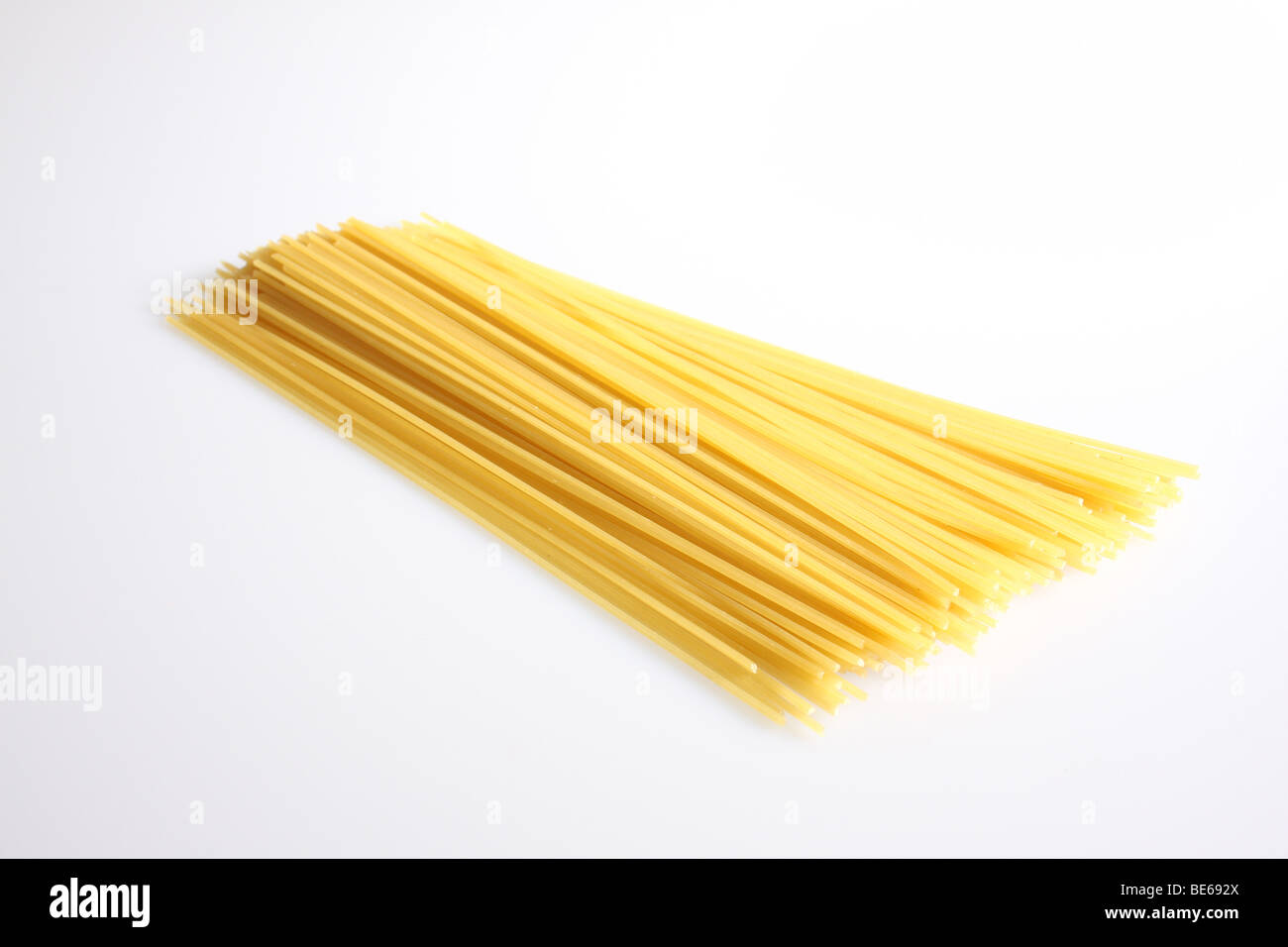 A studio photograph of uncooked spaghetti Stock Photo - Alamy