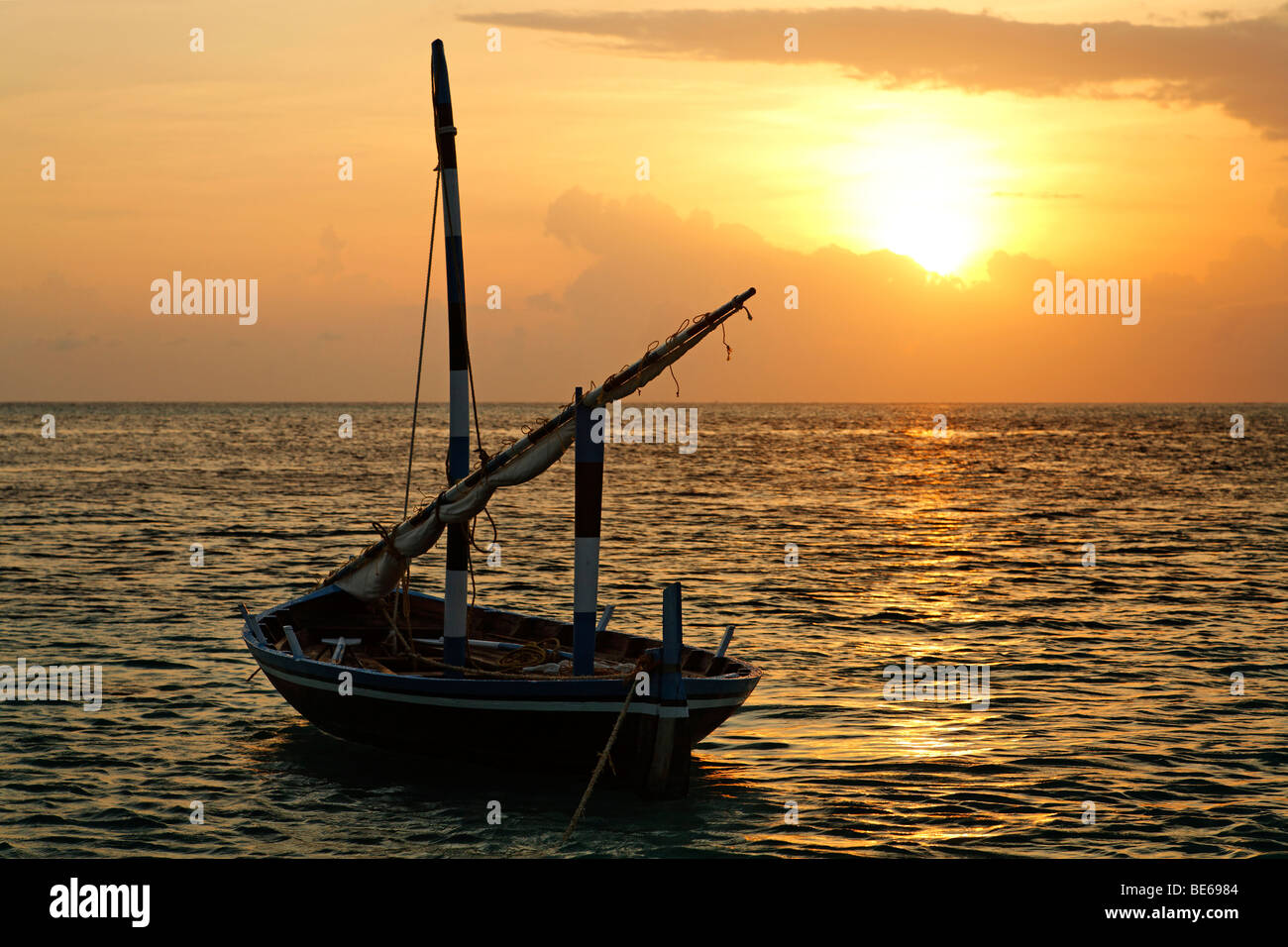 Dhoni at sunset, sea, Vadoo, island, South Male Atoll, Maldives ...