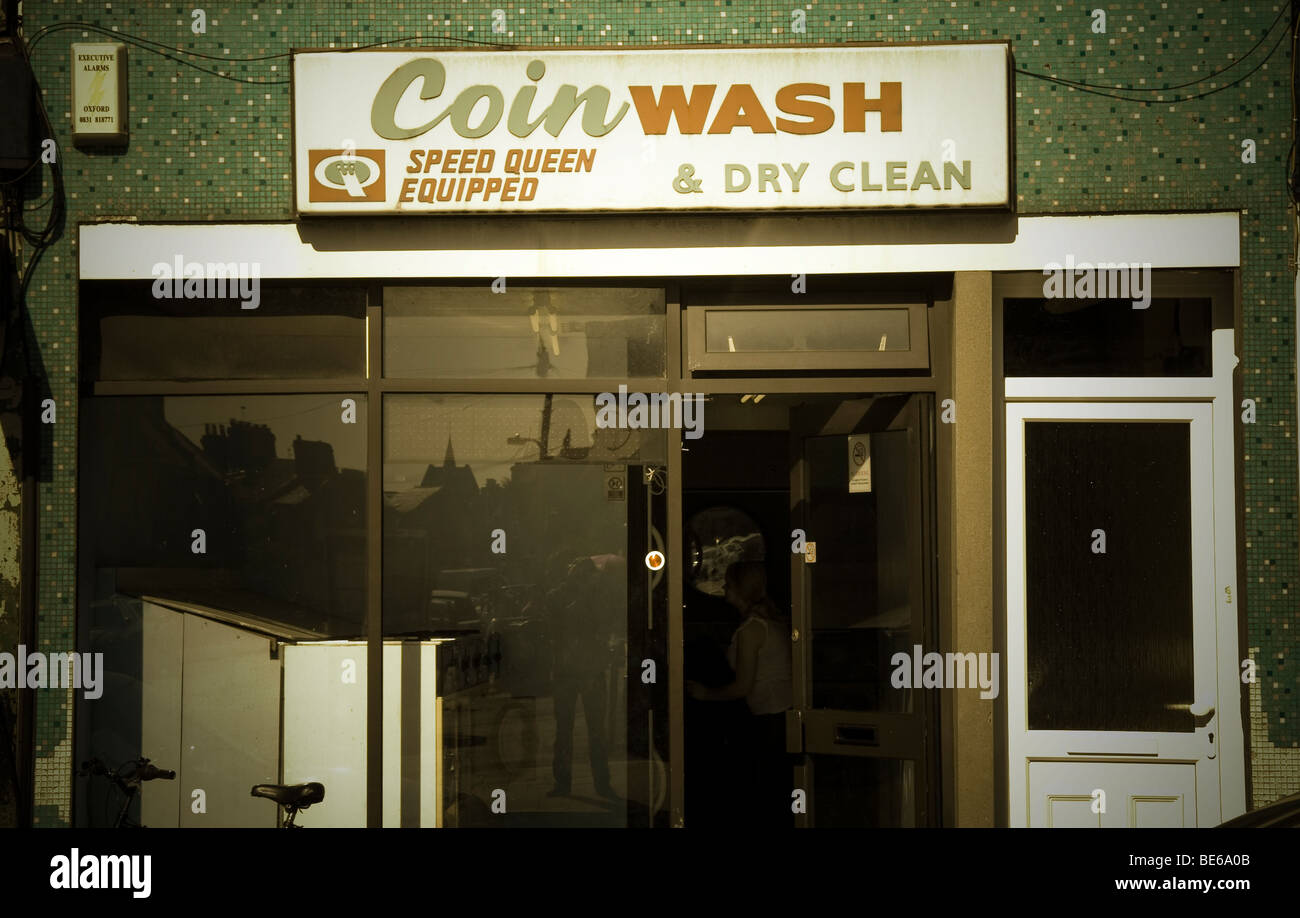 Coin Wash launderette and dry clean Stock Photo - Alamy