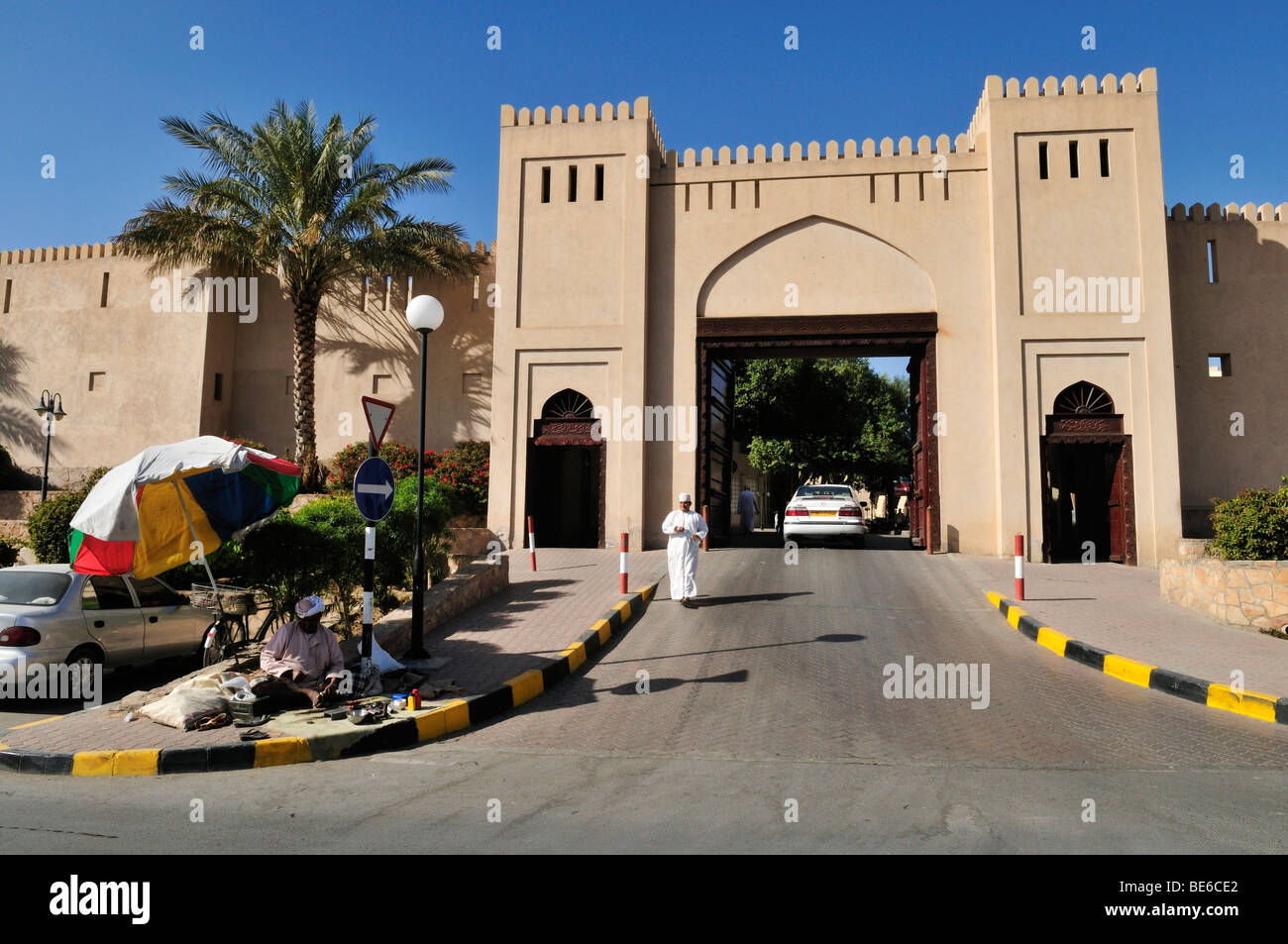 Entrance gate to the modern Nizwa Souk, Hajar al Gharbi Mountains ...
