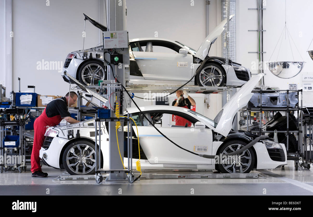 Audi employees doing final inspections of the Audi R8 sports car at the ...
