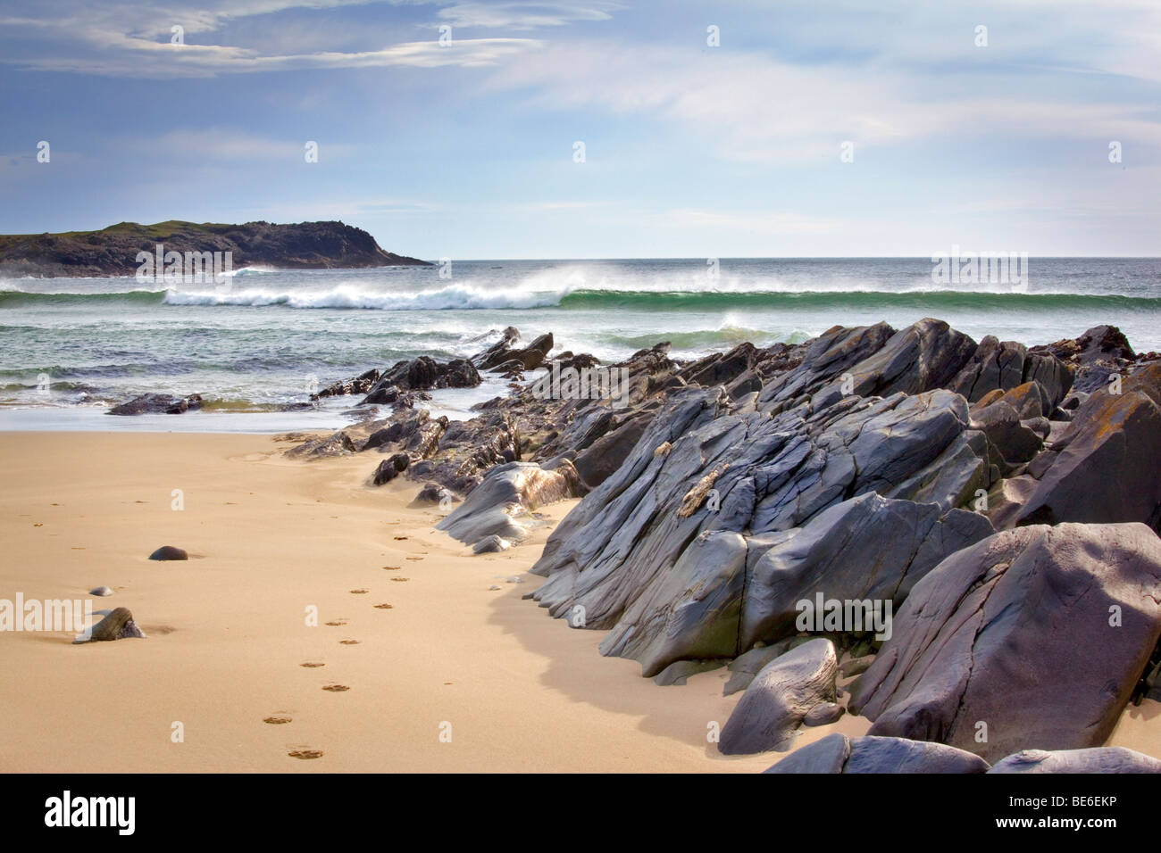Footsteps on the beach at Saligo Bay on the Hebridean island of Islay ...