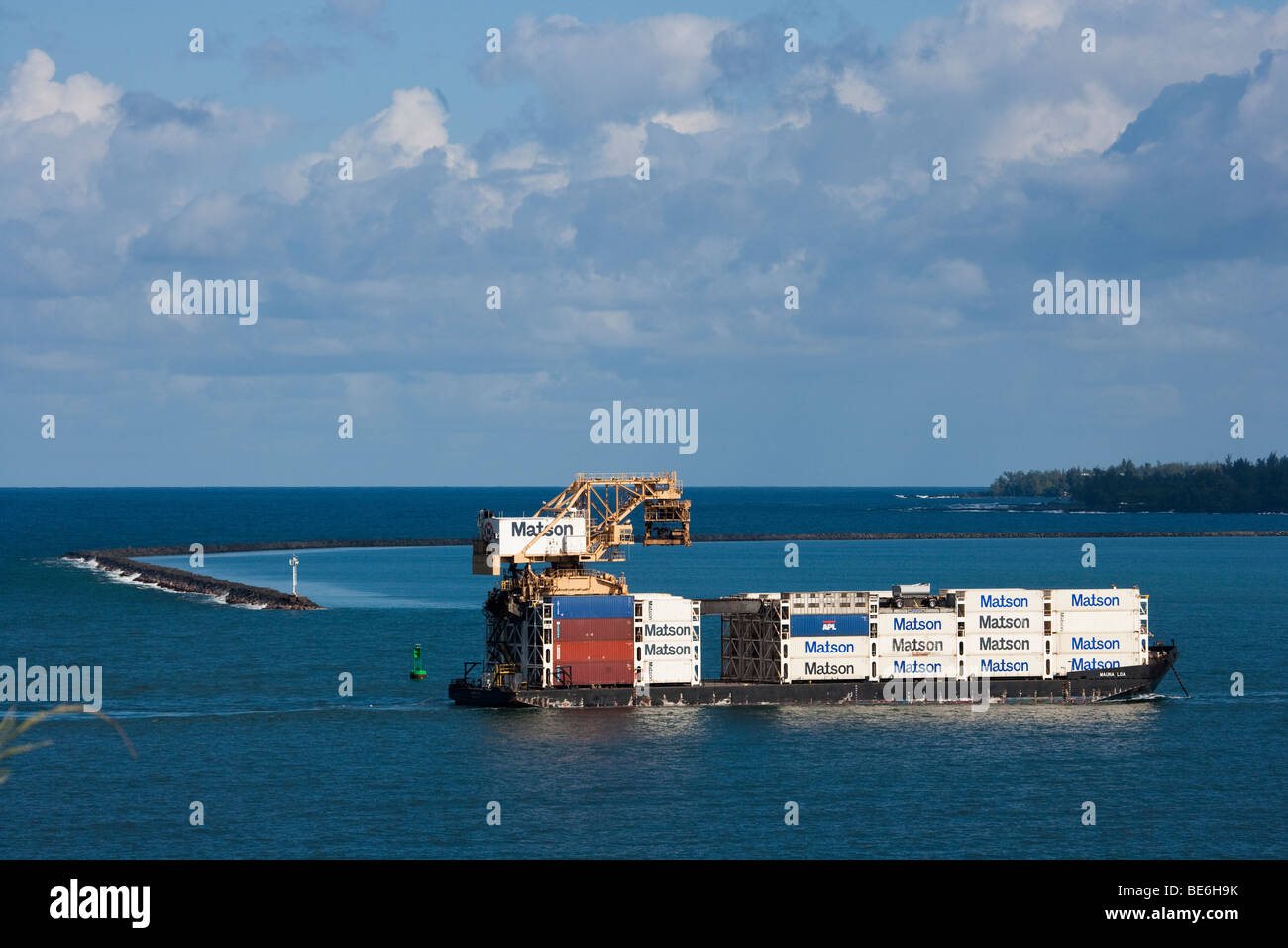 Inter-island cargo barge enters Hilo Bay Stock Photo - Alamy