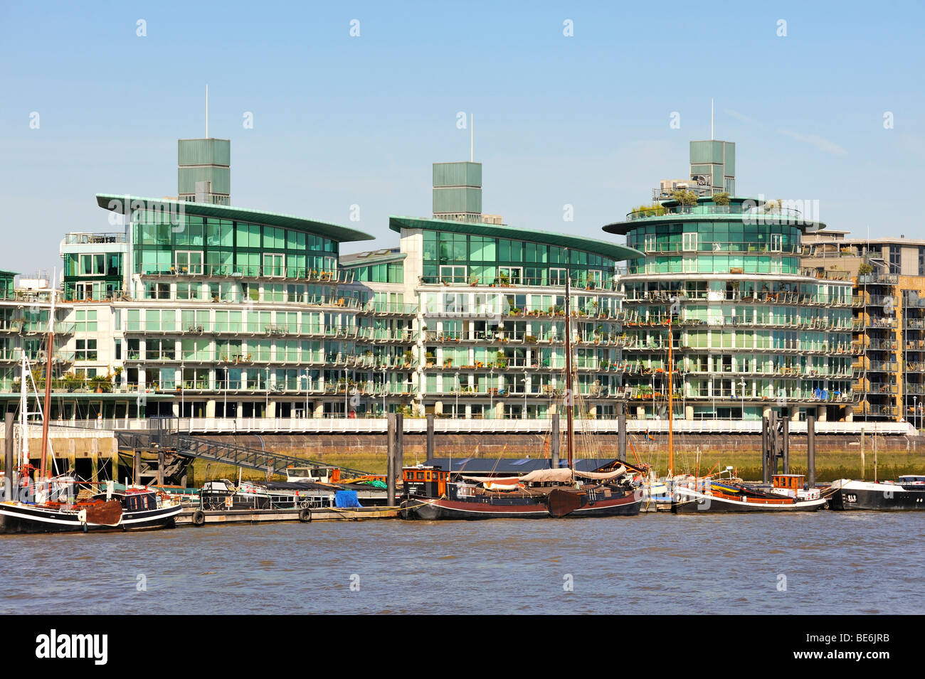 The banks of the Thames, with modern residential buildings, London ...