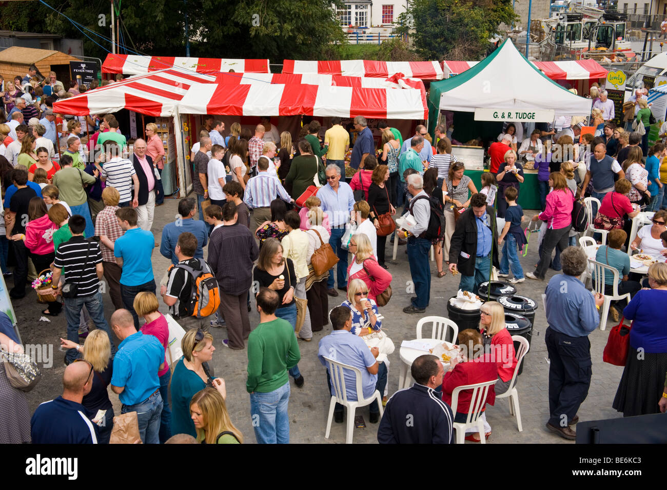 Crowded outdoor food stall area at Abergavenny Food Festival ...