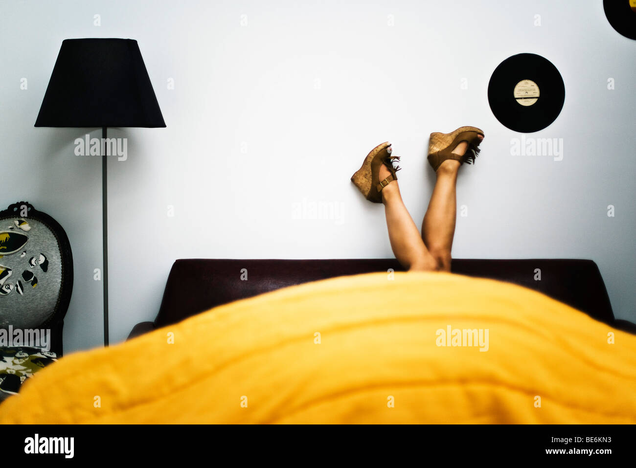 Woman's legs raised, wearing platform shoes Stock Photo - Alamy