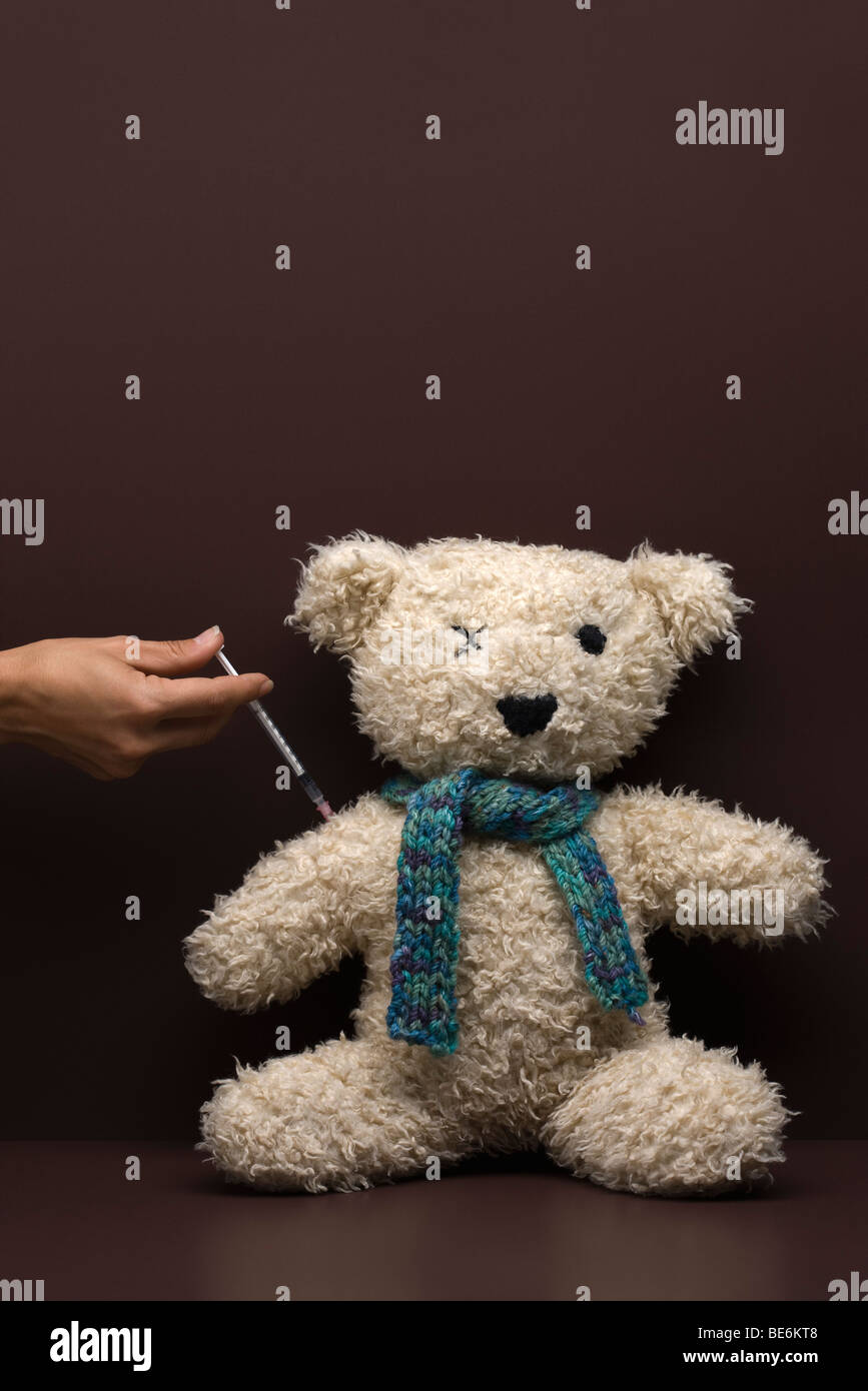 Teddy getting vaccination injection hi-res stock photography and images ...