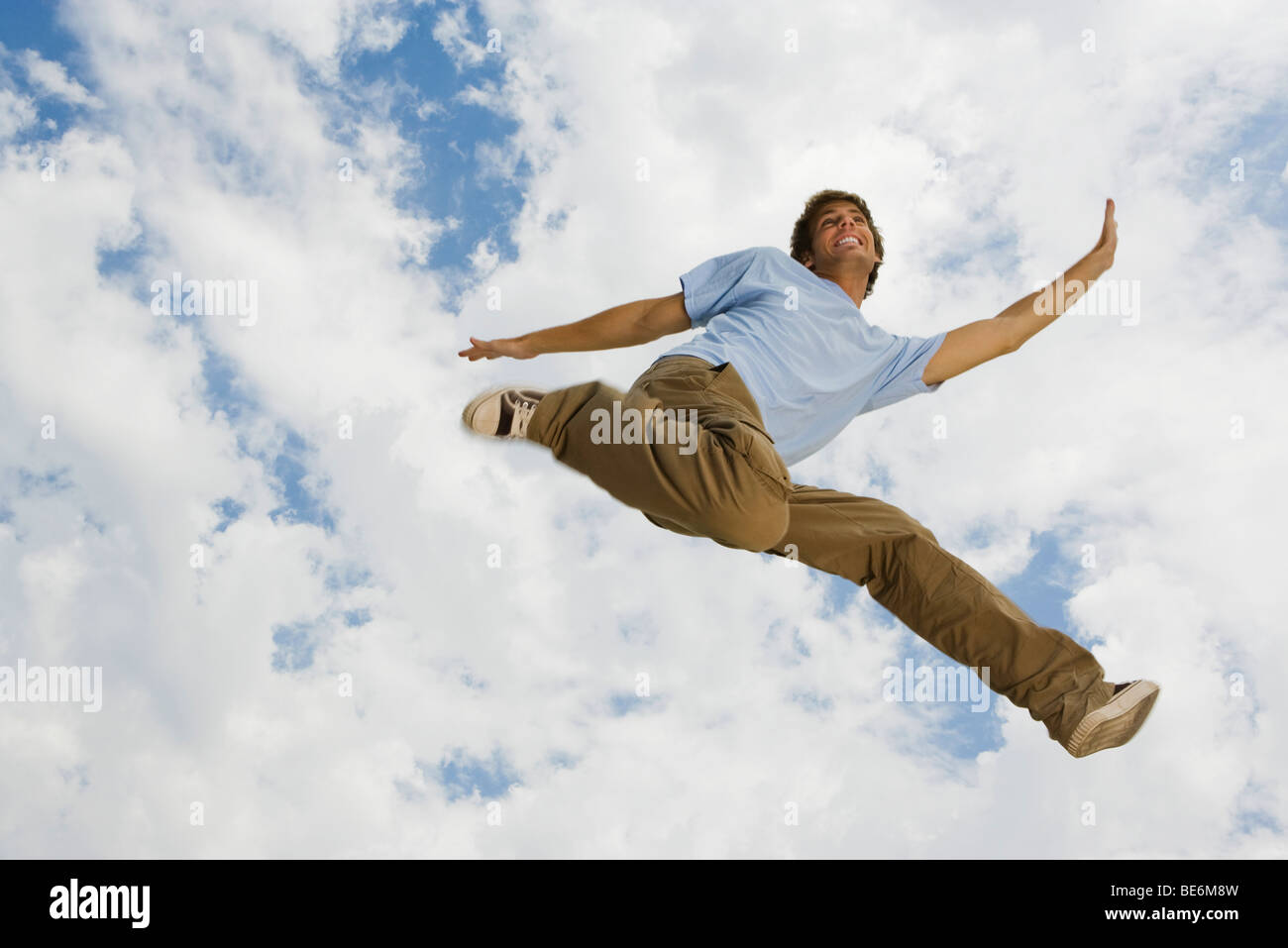 Man jumping joyfully in hi-res stock photography and images - Alamy