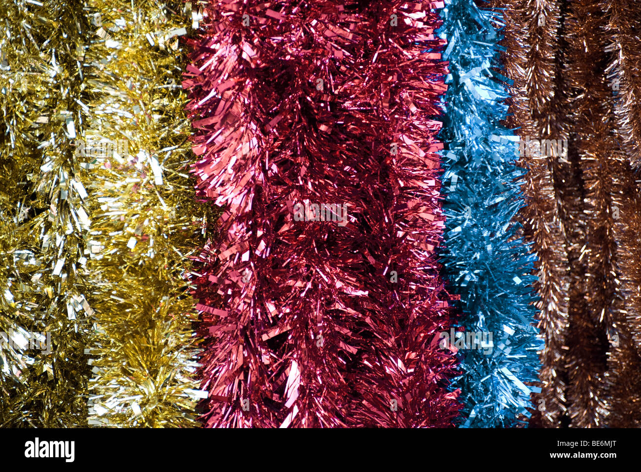 Metallic Christmas garlands, close-up Stock Photo - Alamy