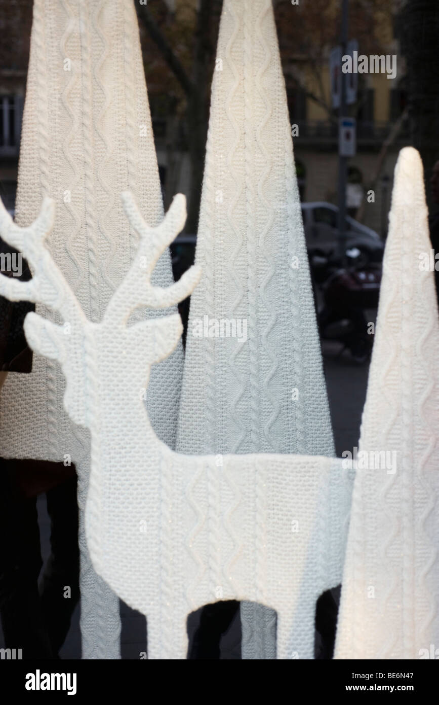 Shop window with Christmas display of reindeer and trees Stock Photo ...