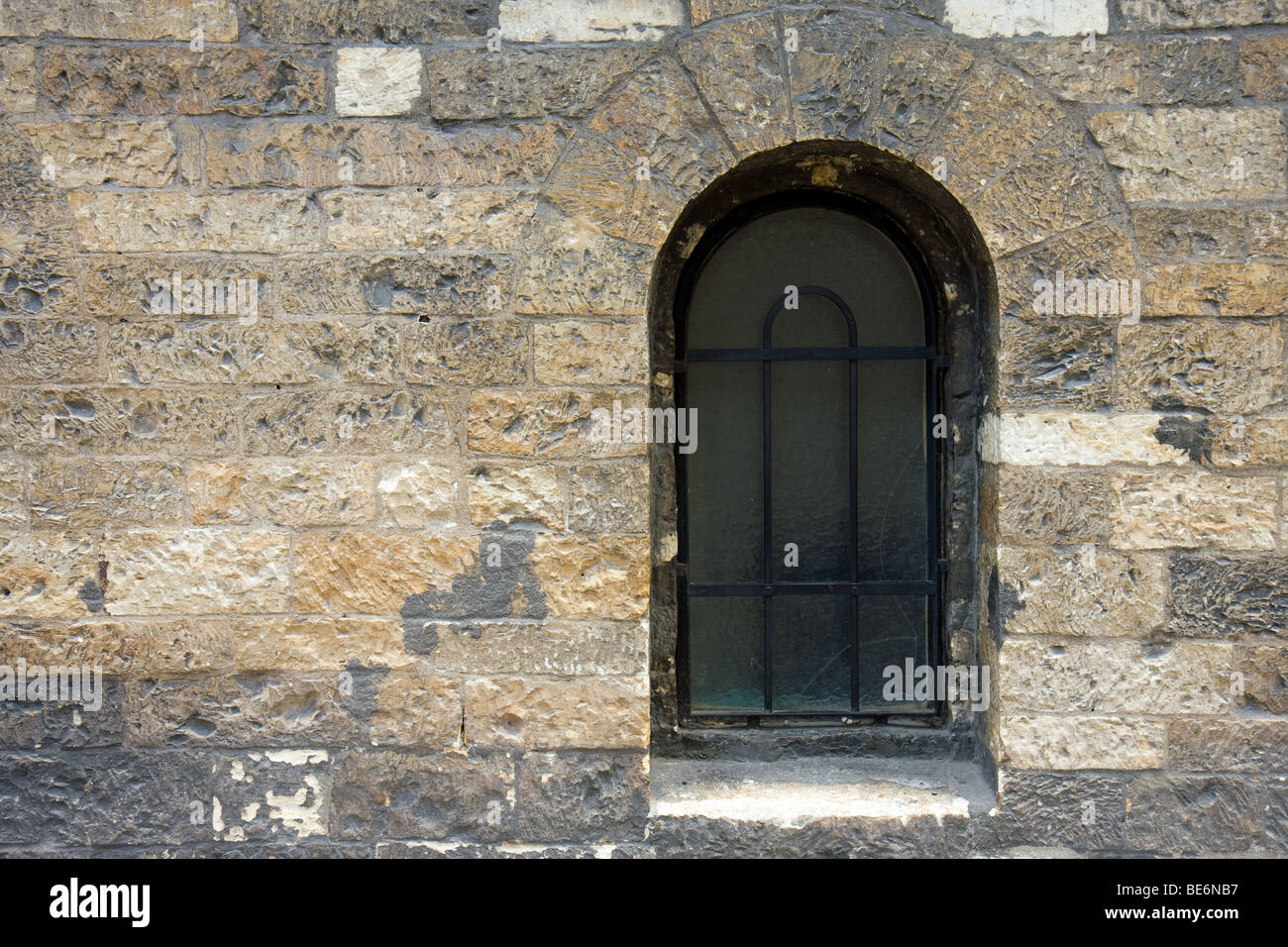 the antique window in stone wall Stock Photo - Alamy