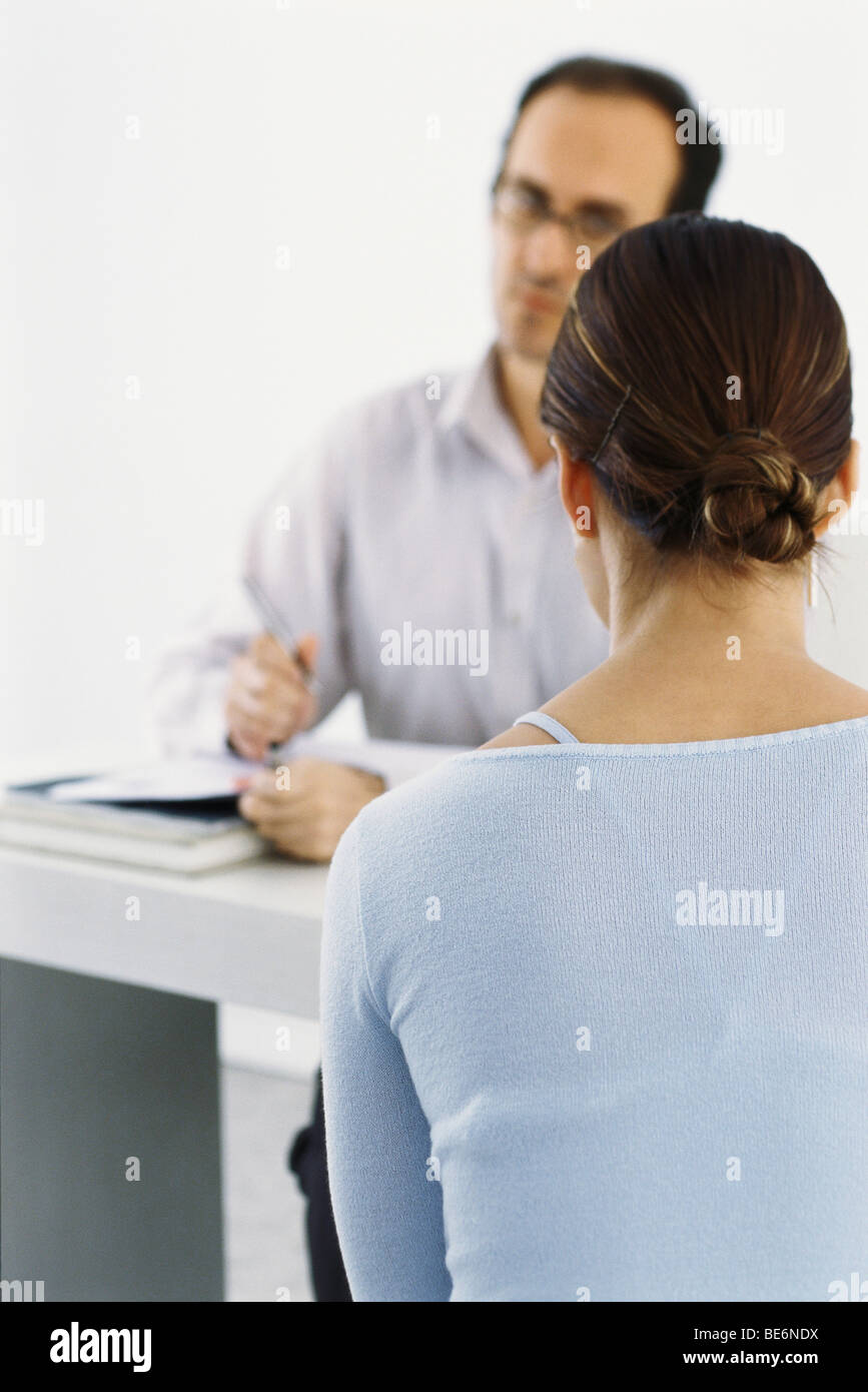 Woman answering questions for job interview Stock Photo - Alamy