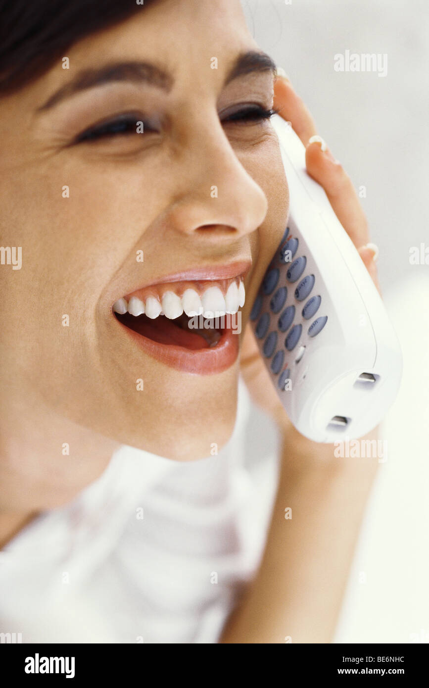 Woman on phone call, smiling and laughing Stock Photo - Alamy