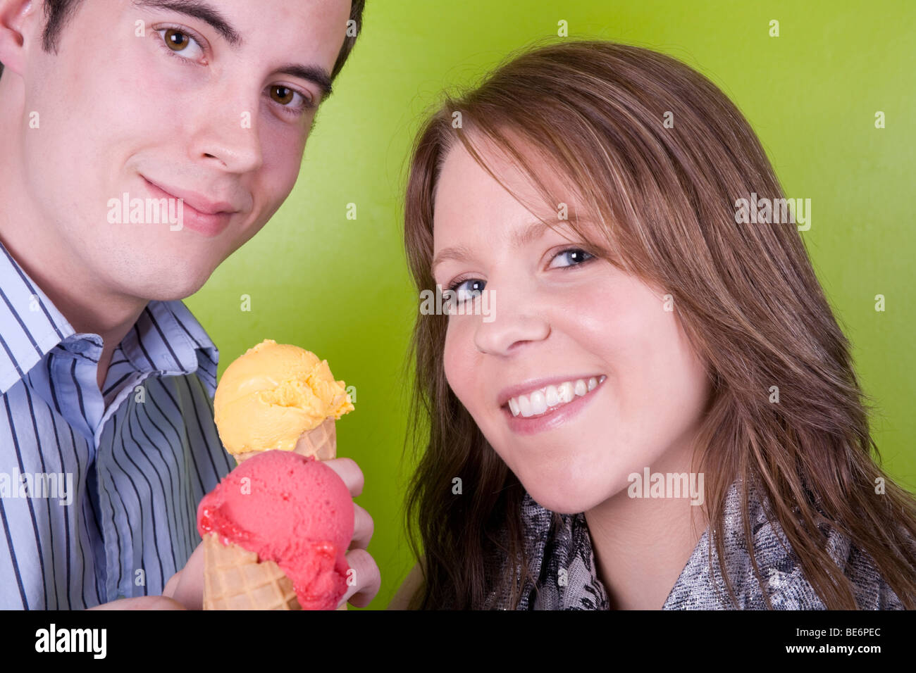 Couple sharing ice cream sundae hi-res stock photography and images - Alamy