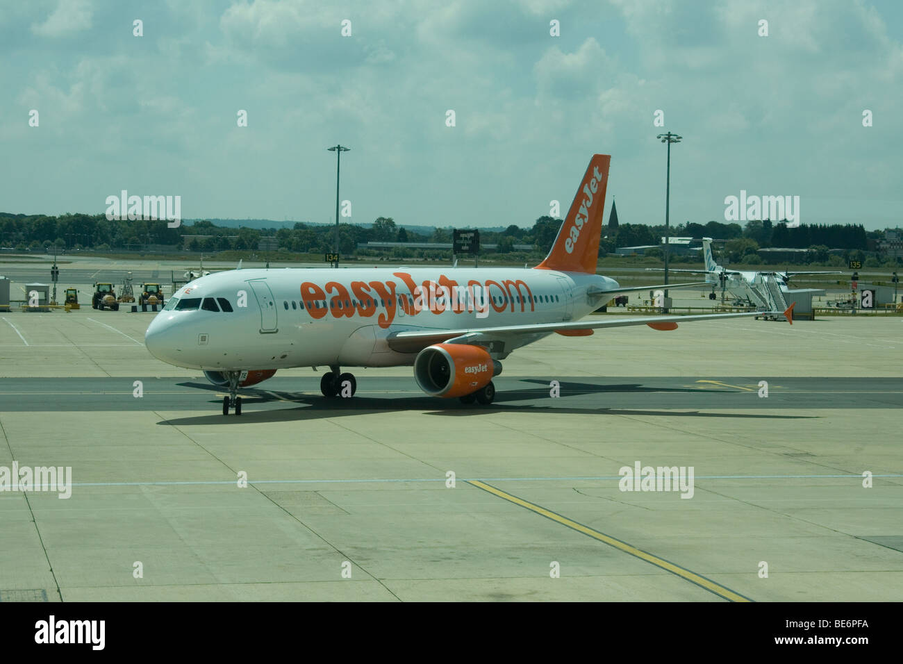 Easyjet Airbus A319 approaches docking gate at Gatwick Airport London ...