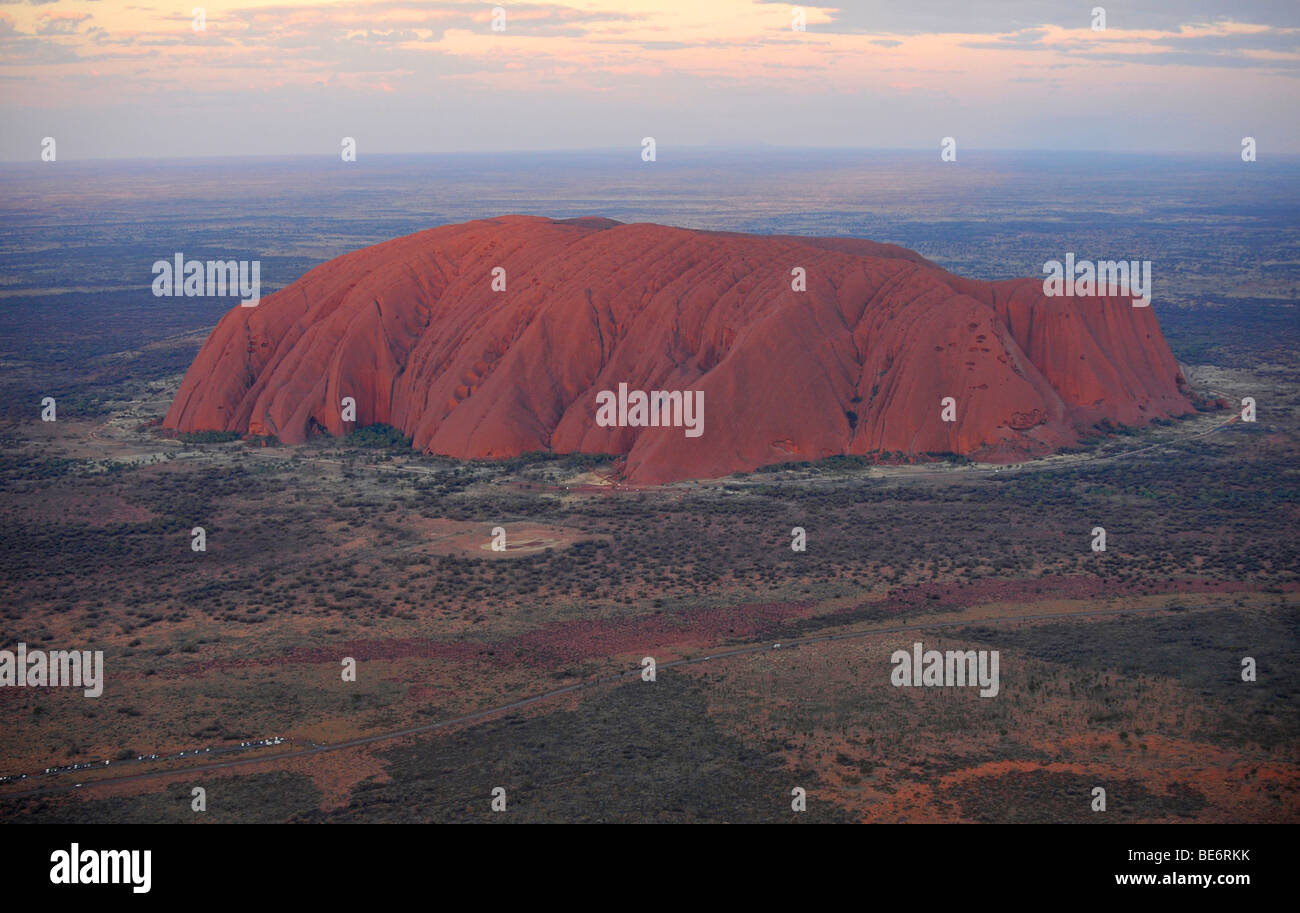 Aerial view of a Uluru, Ayers Rock at sunset, Uluru-Kata Tjuta National ...