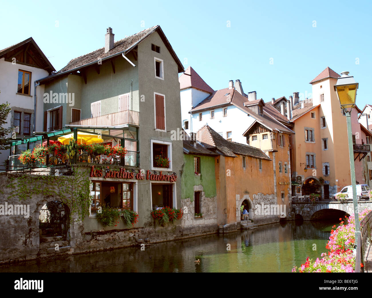 Old buildings beside a river in France Stock Photo - Alamy