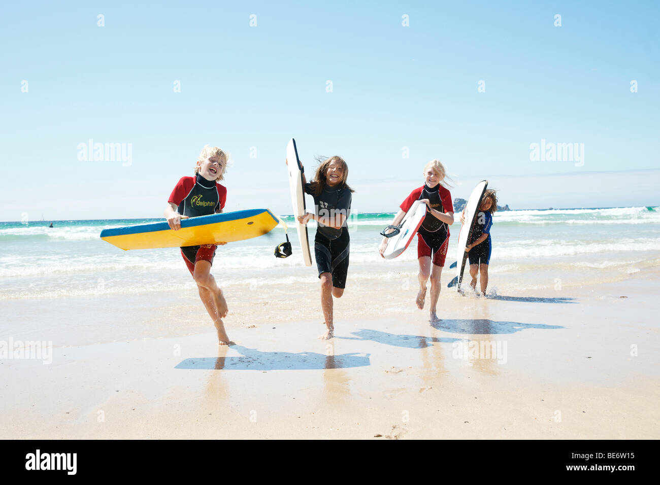 Three Boy Surfers High Resolution Stock Photography and Images - Alamy