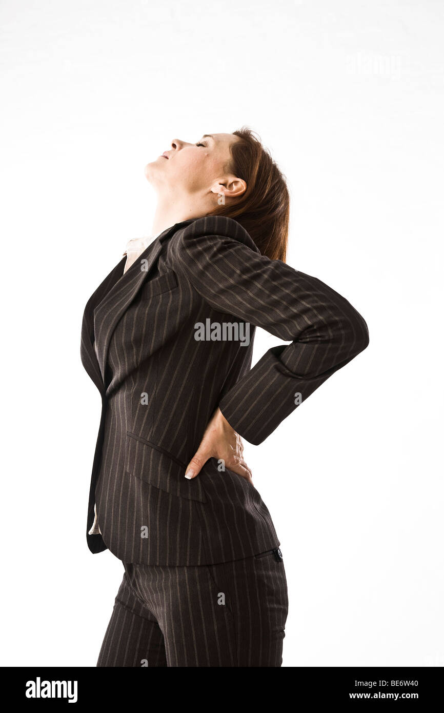 Business woman, back aching Stock Photo - Alamy