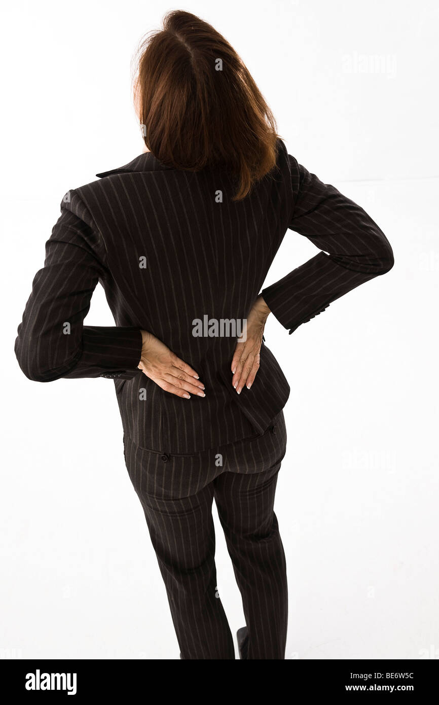 Business woman, back aching Stock Photo - Alamy