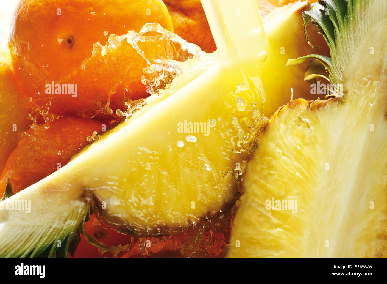 Pouring fresh orange juice through hi-res stock photography and images ...