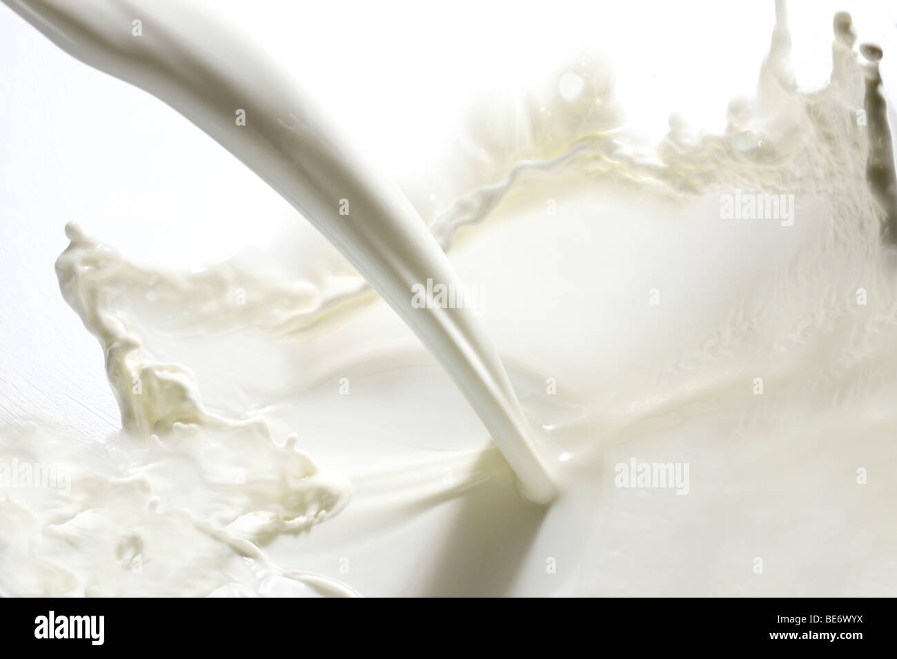 Spray of milk Stock Photo - Alamy