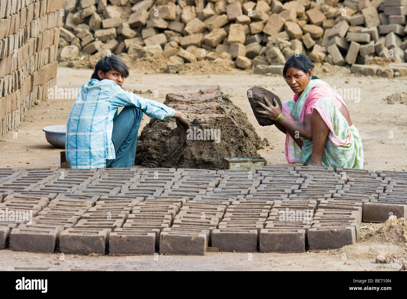 Man making mud bricks hi-res stock photography and images - Alamy