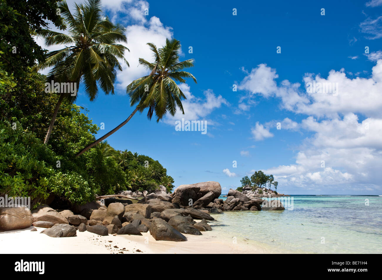 Beach with the typical granite rocks of the Seychelles at Anse Royale ...