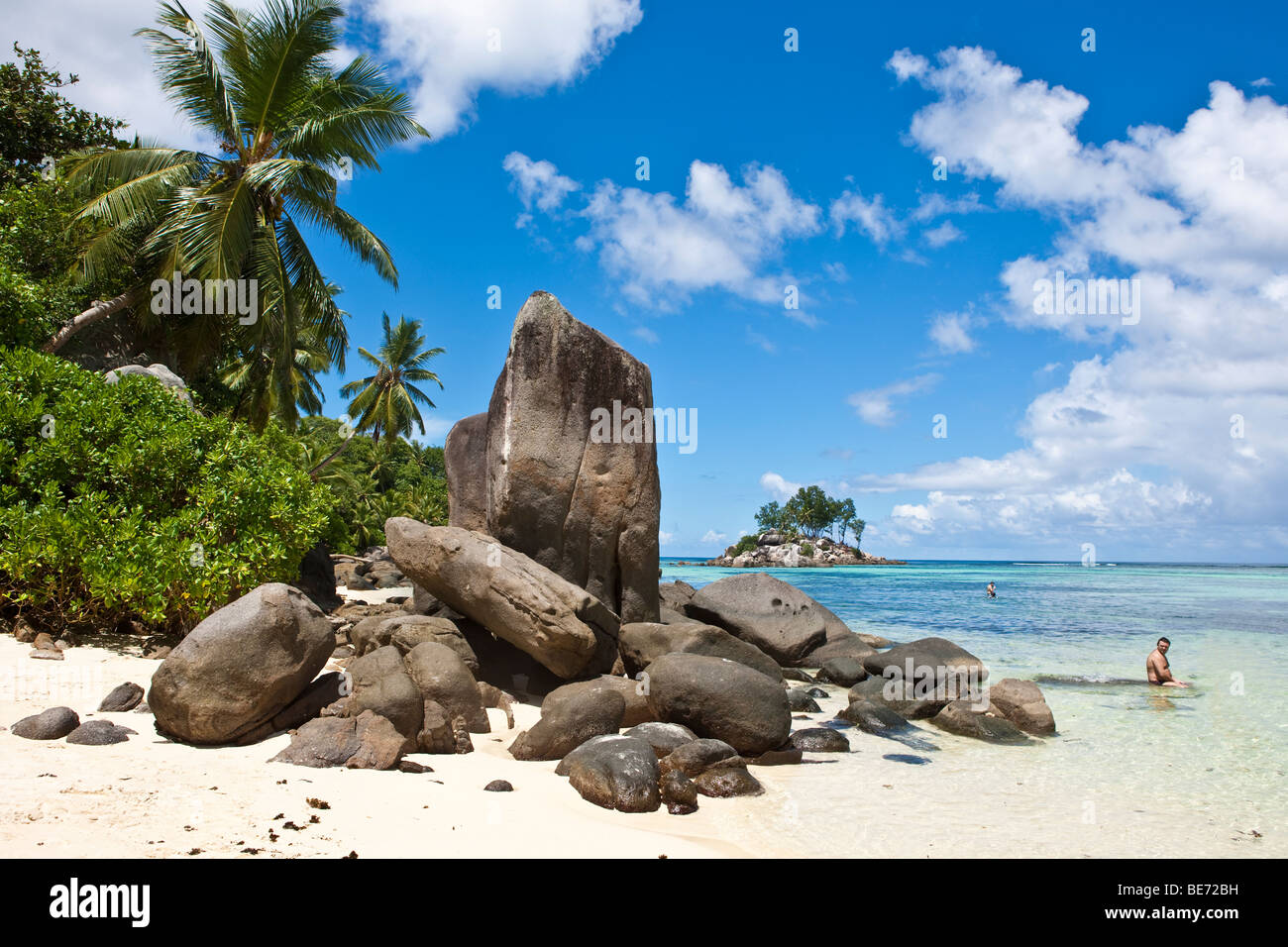 Beach with the typical granite rocks of the Seychelles at Anse Royale ...
