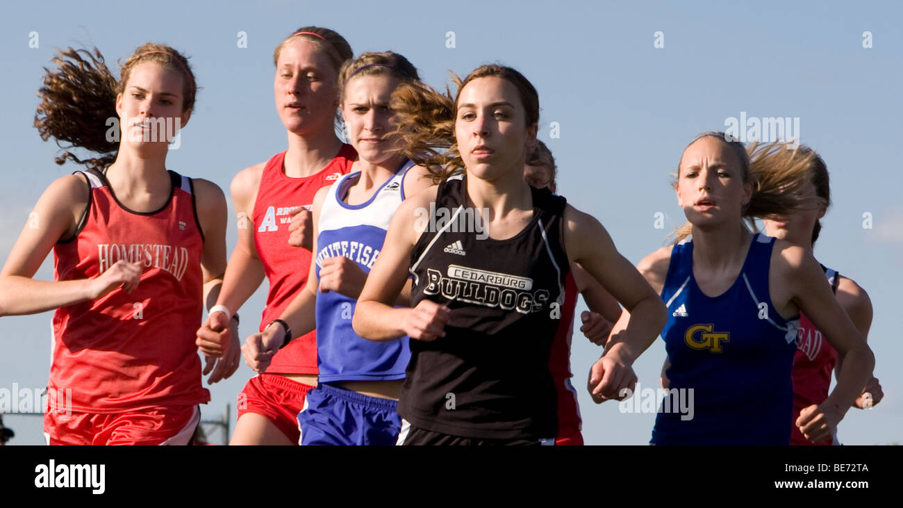 Female high school runners compete hi-res stock photography and images ...