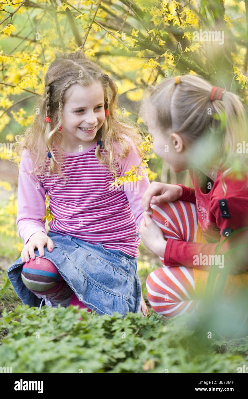 Girls chatting outside Stock Photo - Alamy