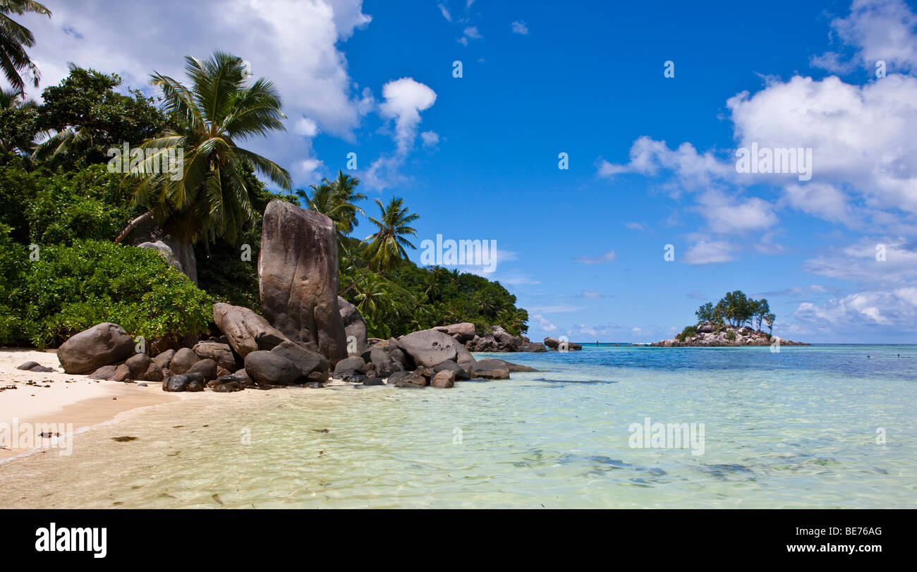 Beach with the typical granite rocks of the Seychelles at Anse Royale ...