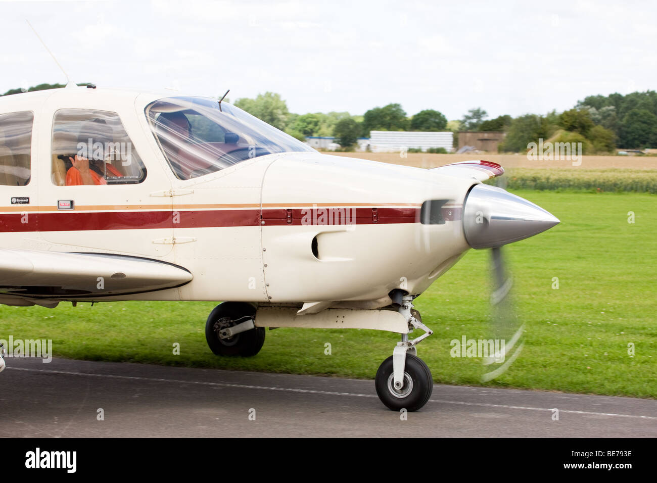 Rockwell Commander 112B N1350J taxiing along runway after landing at ...